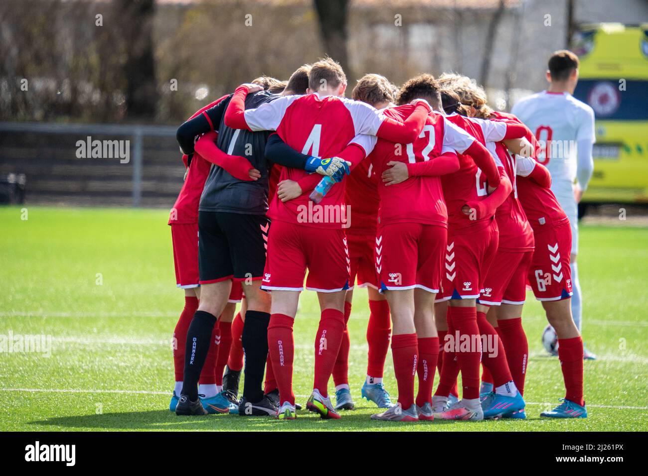 Ikast, Denmark. 29th, March 2022. The players of Denmark unite in a ...