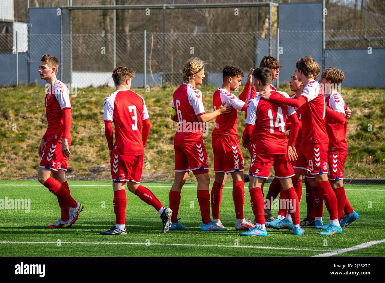 Ikast, Denmark. 29th, March 2022. The players of Denmark celebrate ...