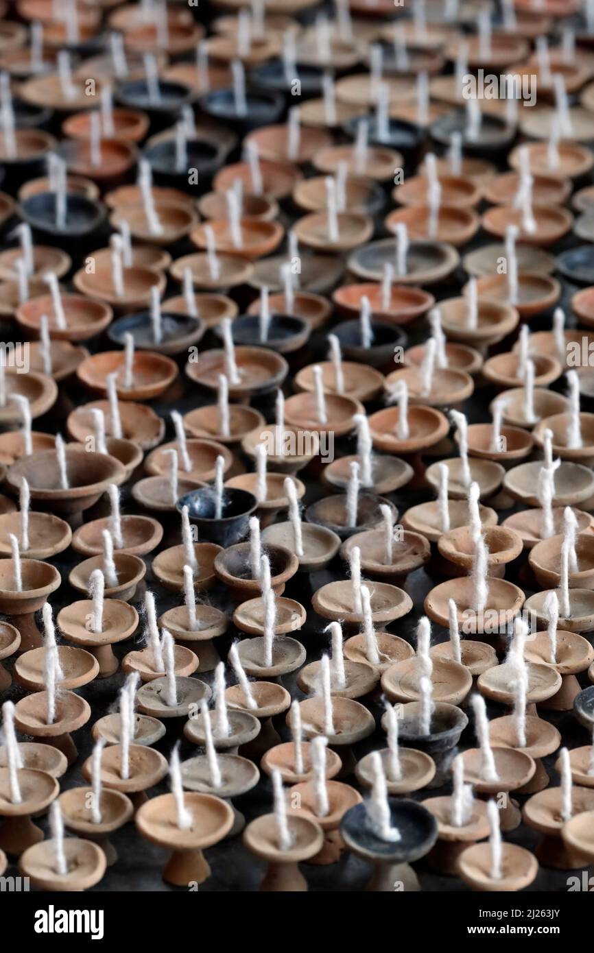 Oil or butter lamps burning in Hindu temple Stock Photo - Alamy