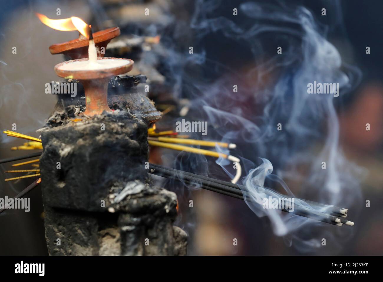Oil butter lamps burning in hindu temple hi-res stock photography and ...