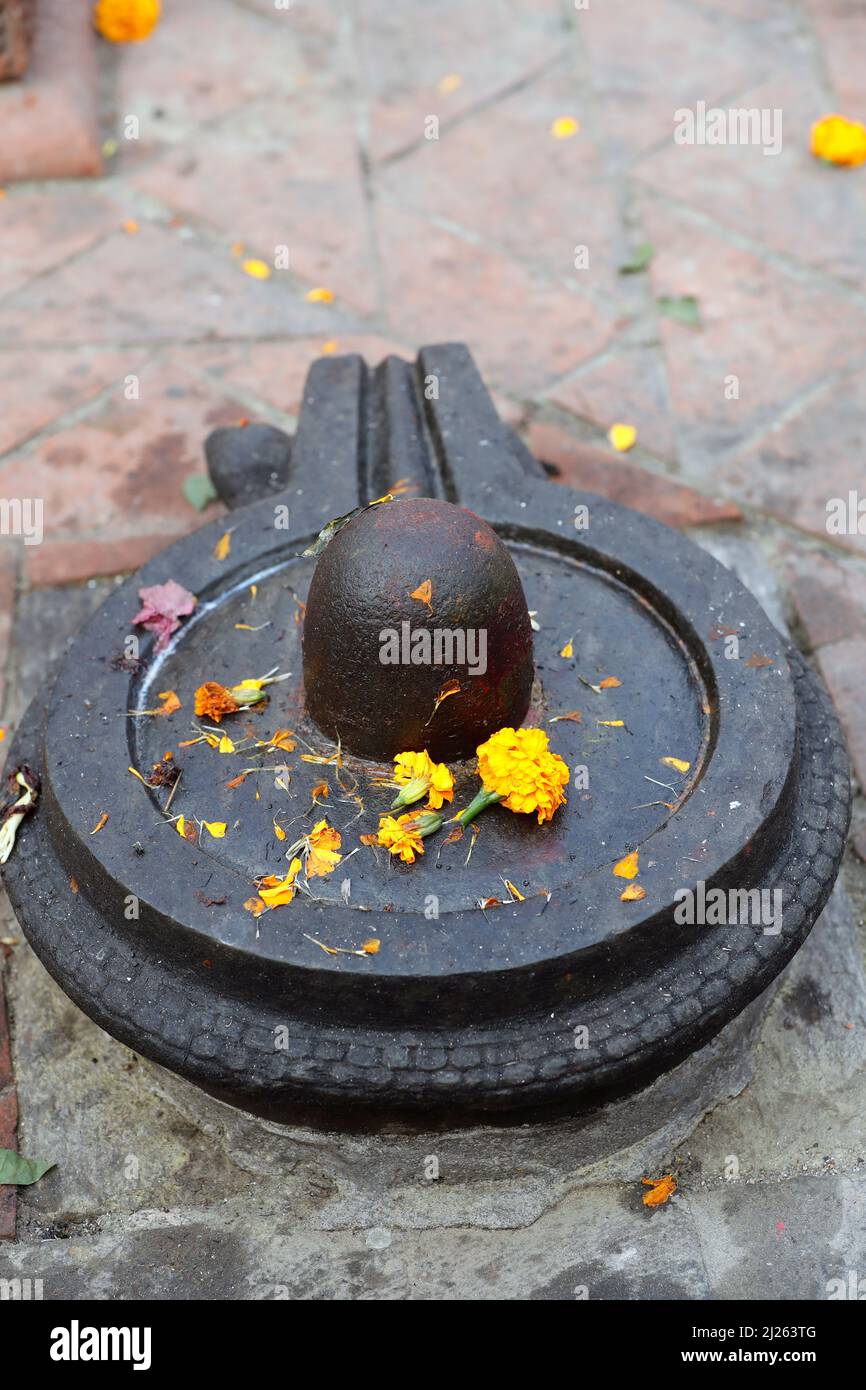 Stone shiva lingam in Hindu temple Stock Photo - Alamy