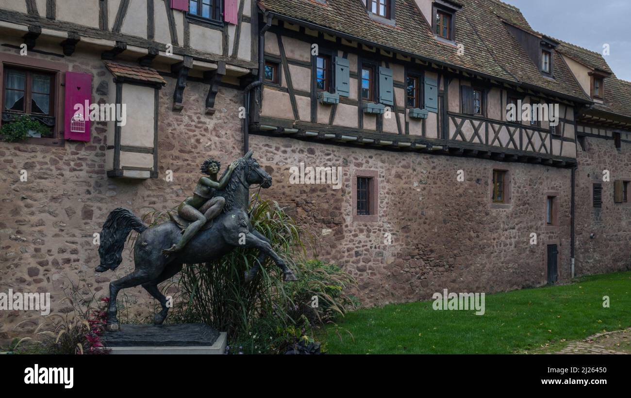 View of Statue in fron of half timbered houses Stock Photo - Alamy