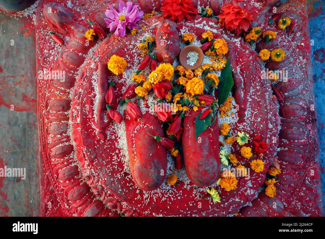 Pema Osel Ling Monastery. Mandala. Red painted Buddha two feet rice and ...