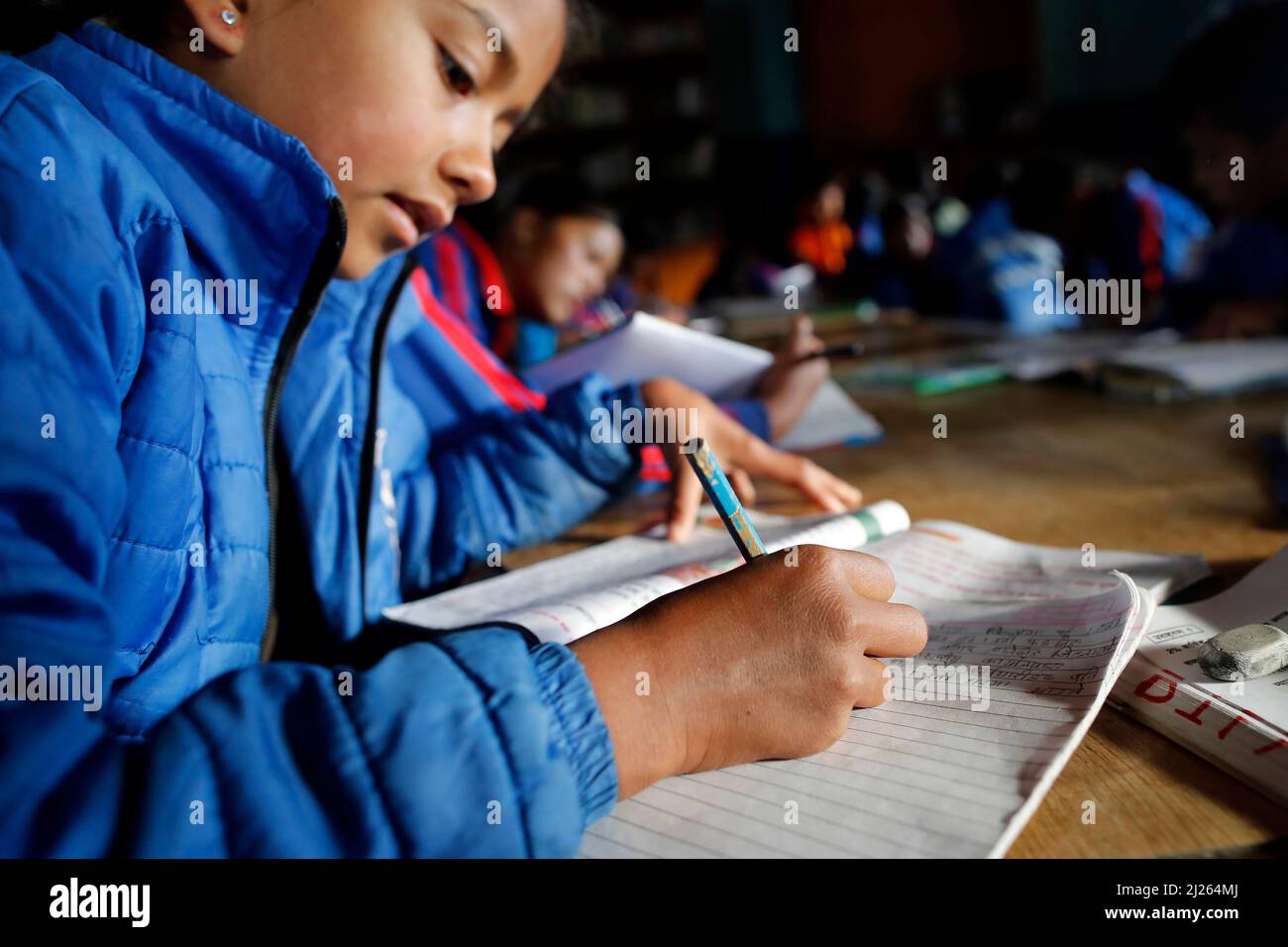 Primary school. Boy with his note book Stock Photo - Alamy
