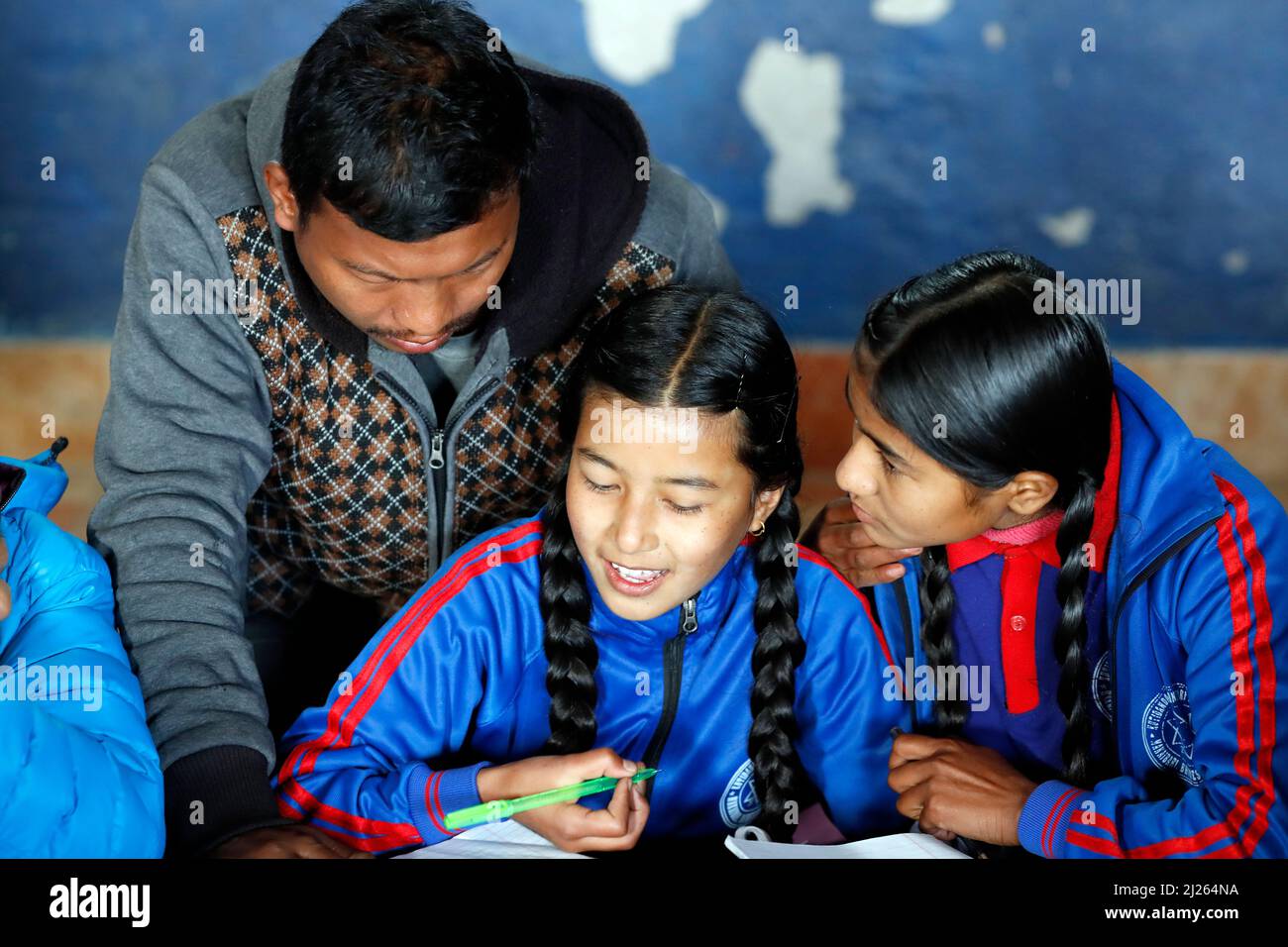 Secondary school. Pupils in classroom with teacher Stock Photo - Alamy