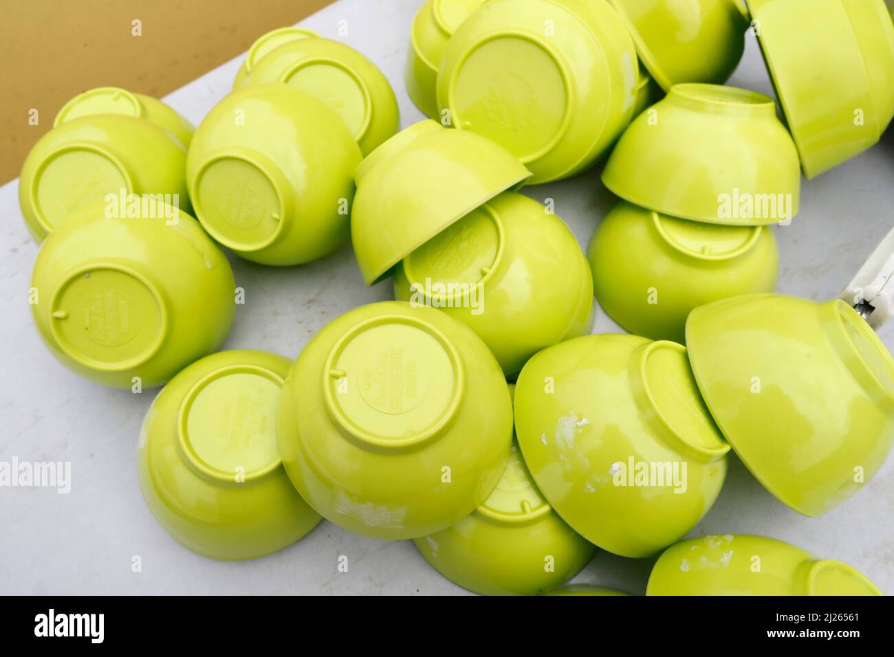 School kitchen canteen, green plastic cups Stock Photo - Alamy
