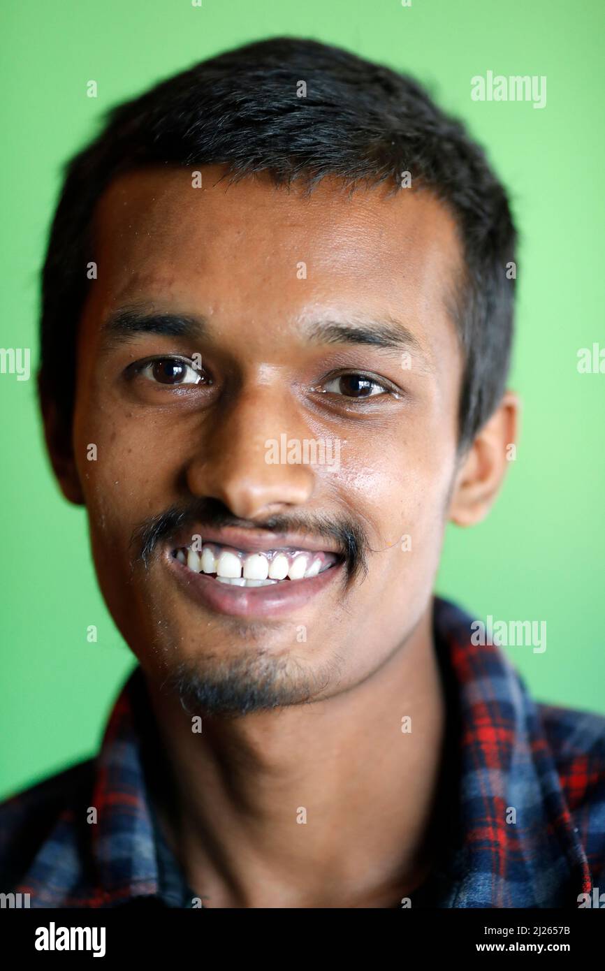 Young smiling nepalese man Stock Photo - Alamy
