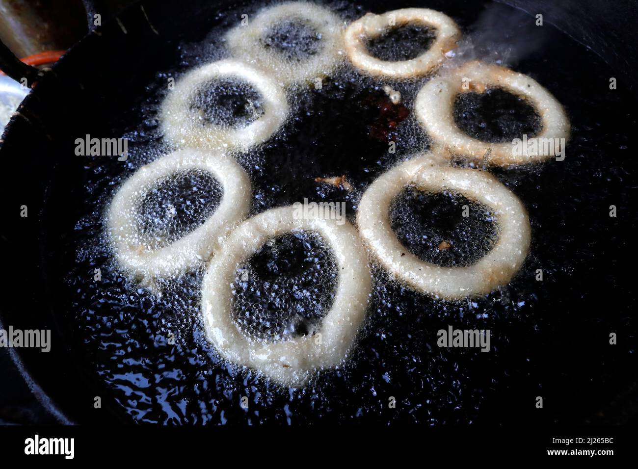 Traditional nepalese restaurant. Fried Sel Roti, the traditional ...