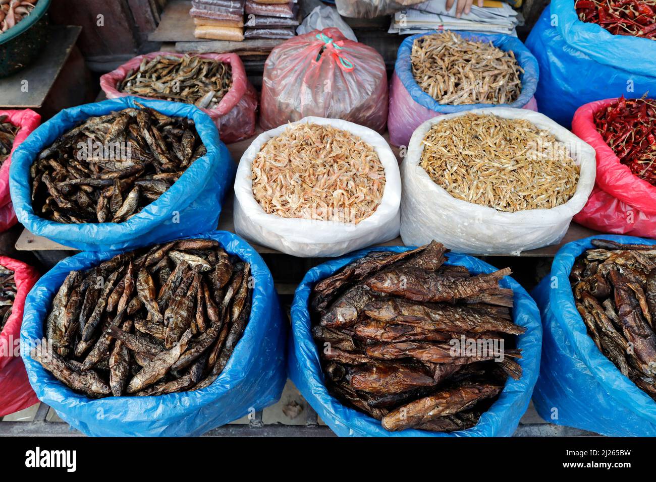 Dry fish for sale at market Stock Photo - Alamy