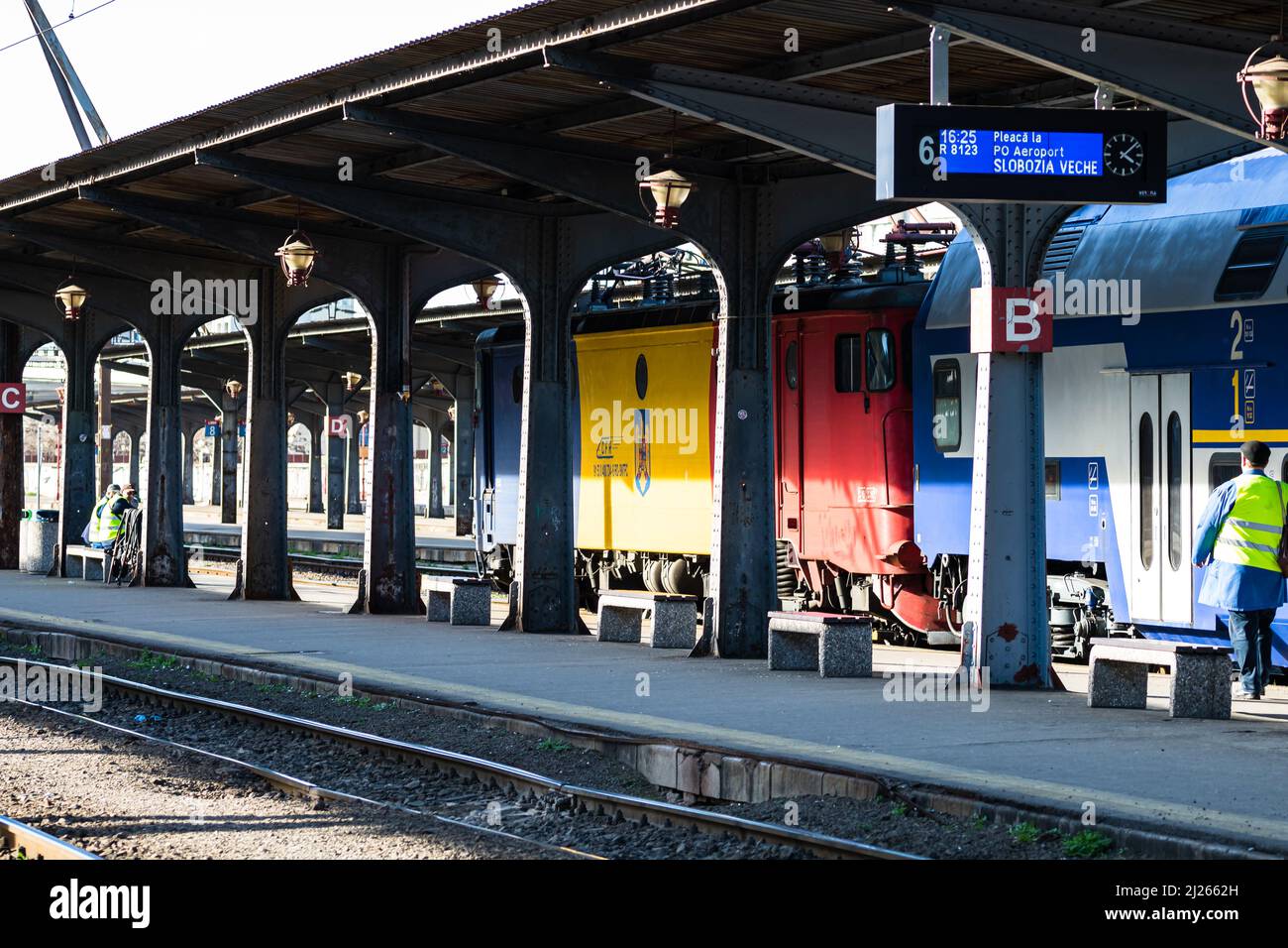 Train in motion or at train platform at Bucharest North Railway Station ...