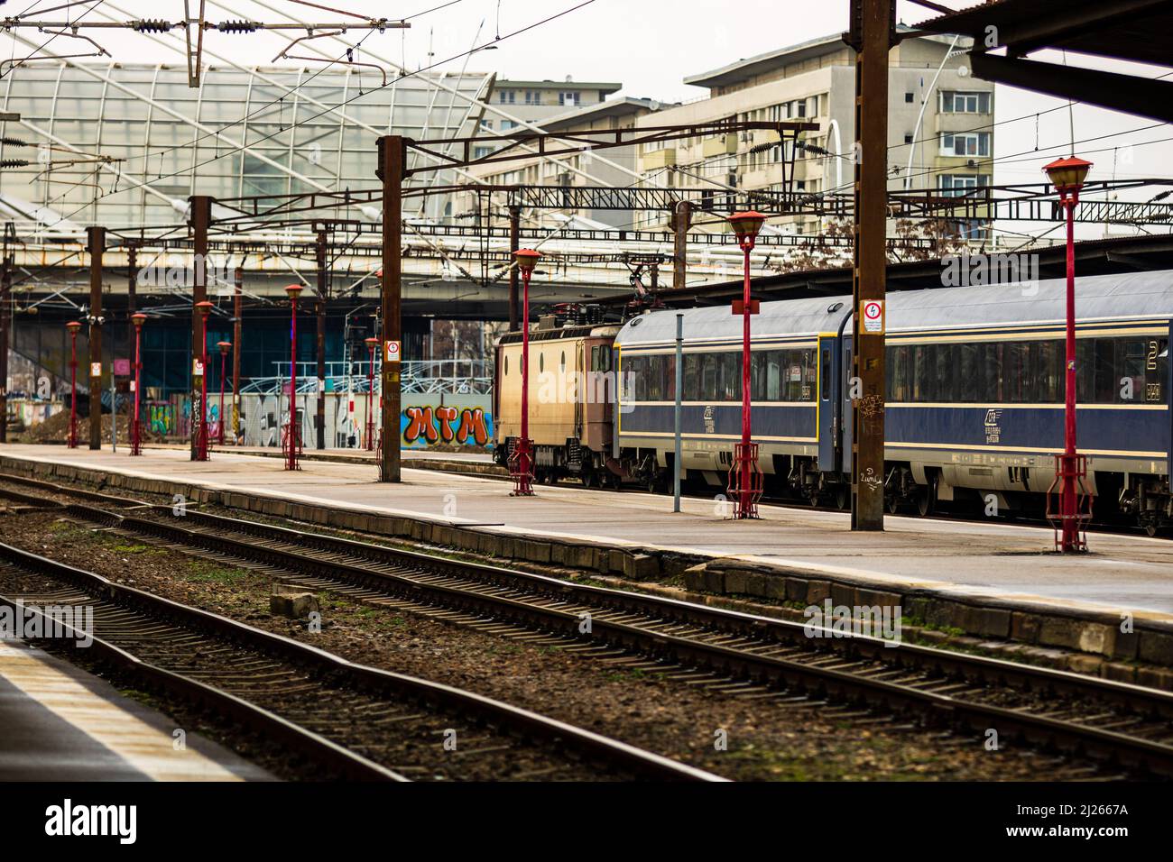 Train in motion or at train platform at Bucharest North Railway Station ...