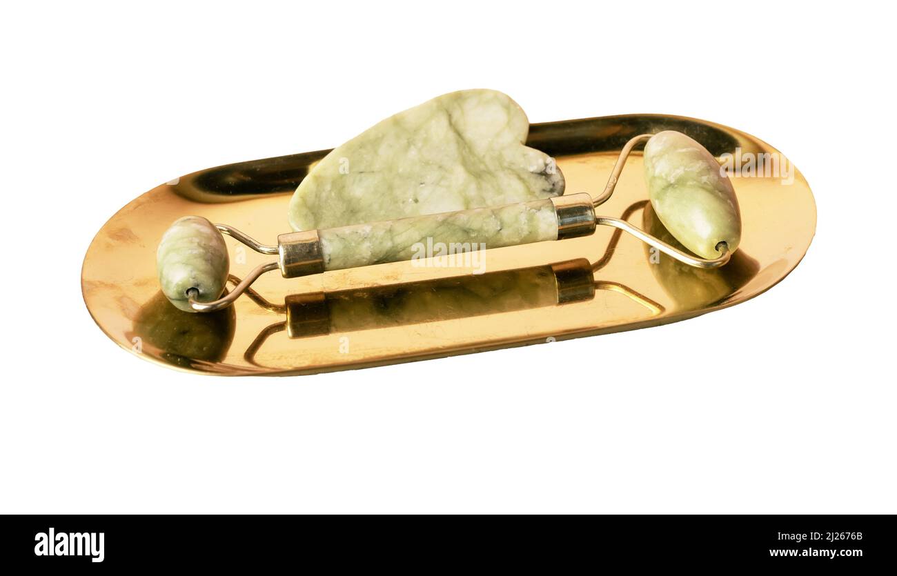Green gua sha facial Cut Out Stock Images & Pictures - Alamy