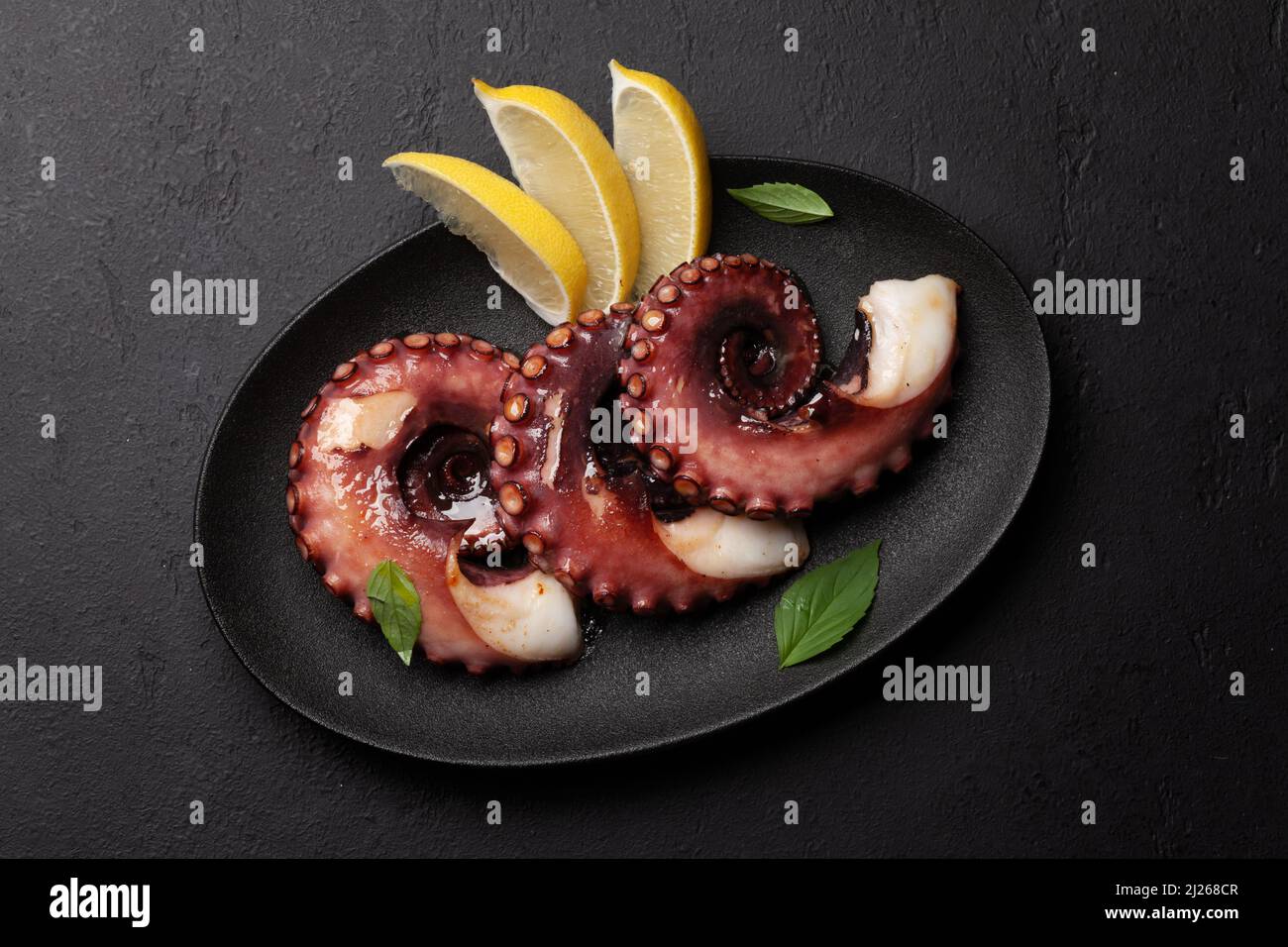 Grilled octopus. Top view flat lay Stock Photo - Alamy