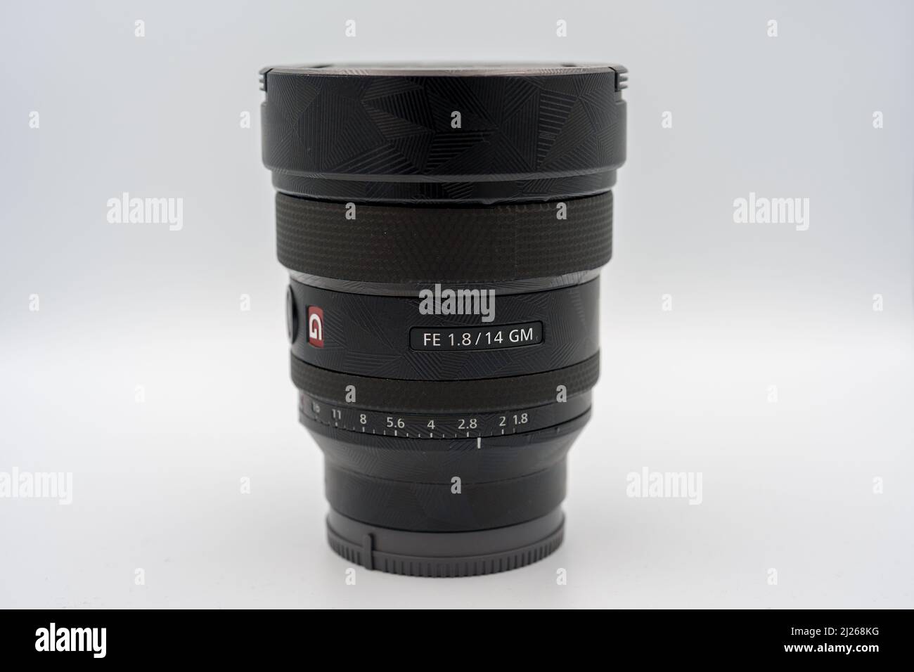 A closeup shot of full frame lens of Sony camera isolated on the white ...