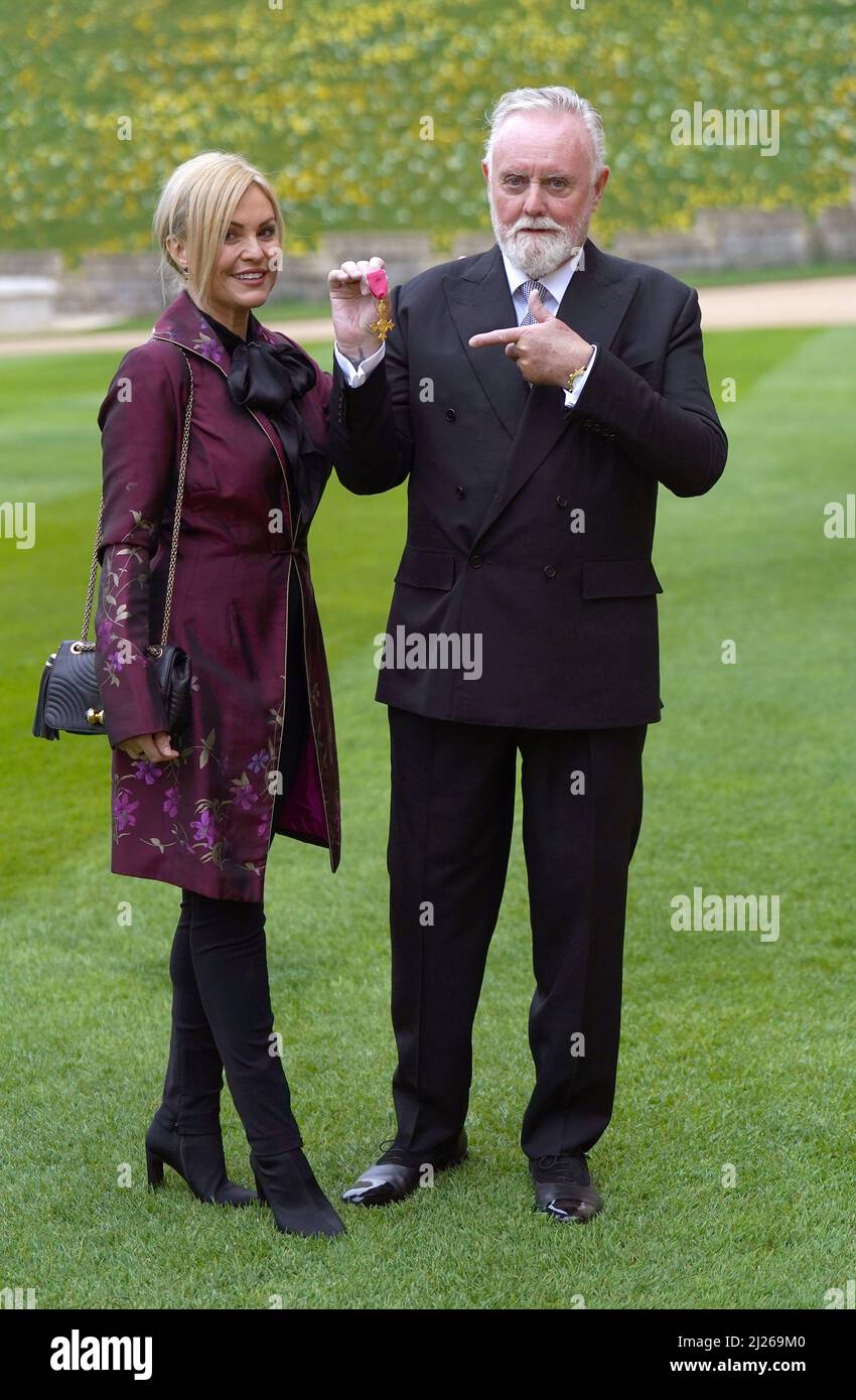 Queen drummer Roger Taylor with his wife Sarina, after being made an ...