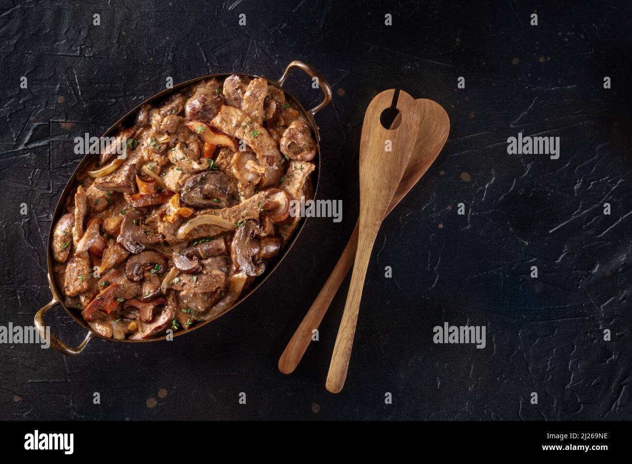 Mushroom beef stroganoff, a casserole of boletus, champignons, and meat ...