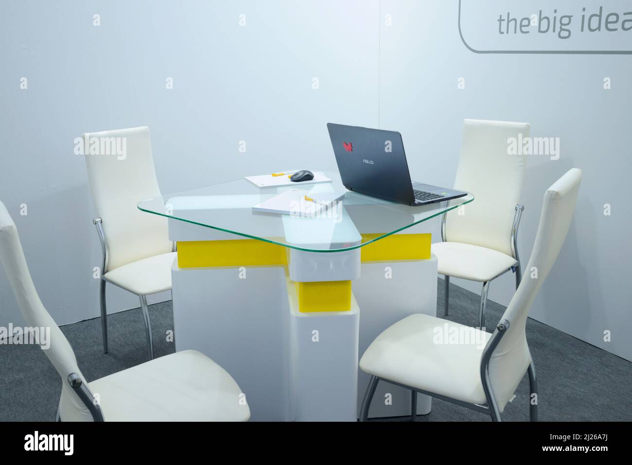 Empty negotiation room. Laptop ASUS, modern chairs and table. October ...