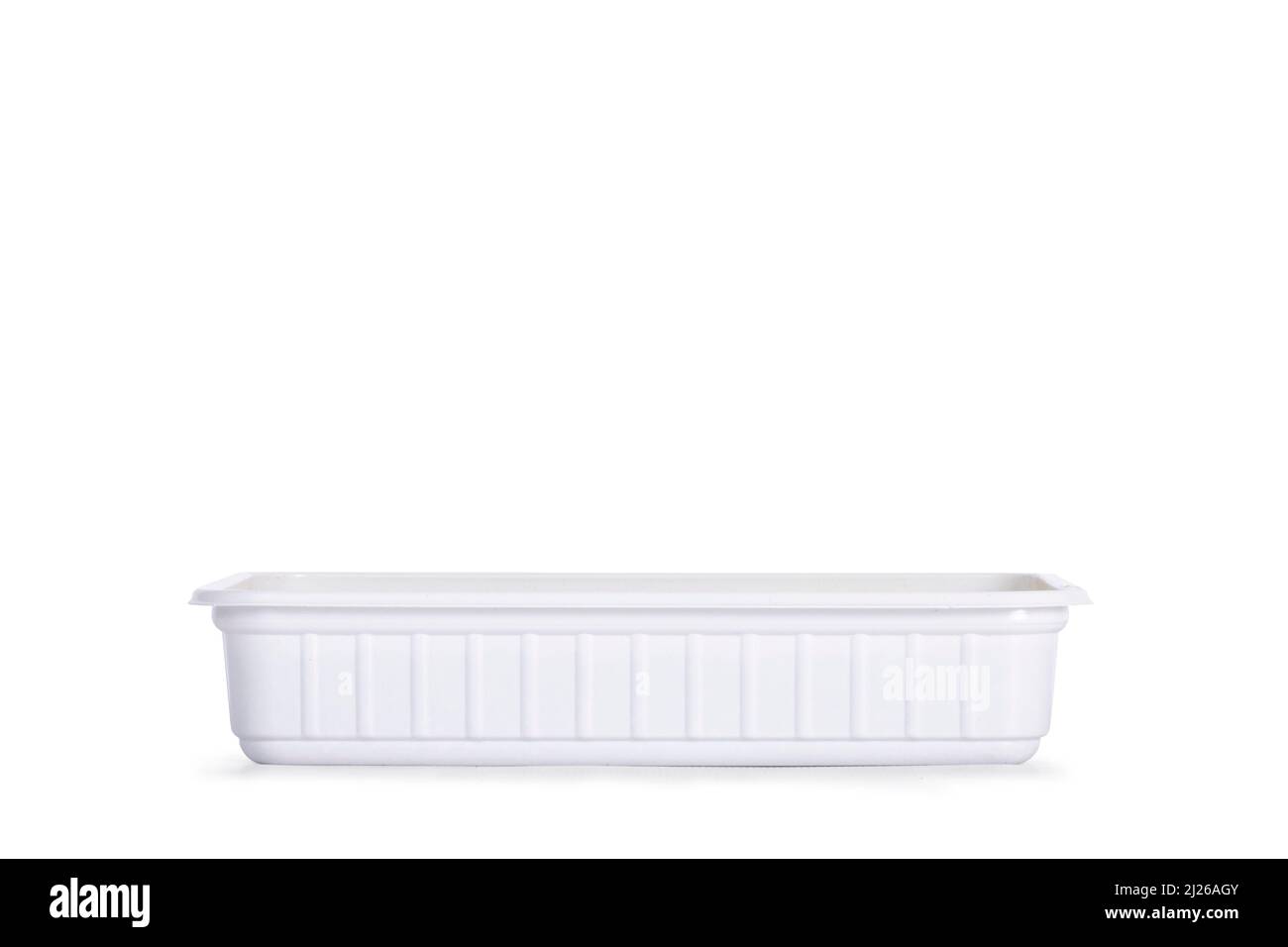 A white plastic container, seen from the side. Isolated on a white ...