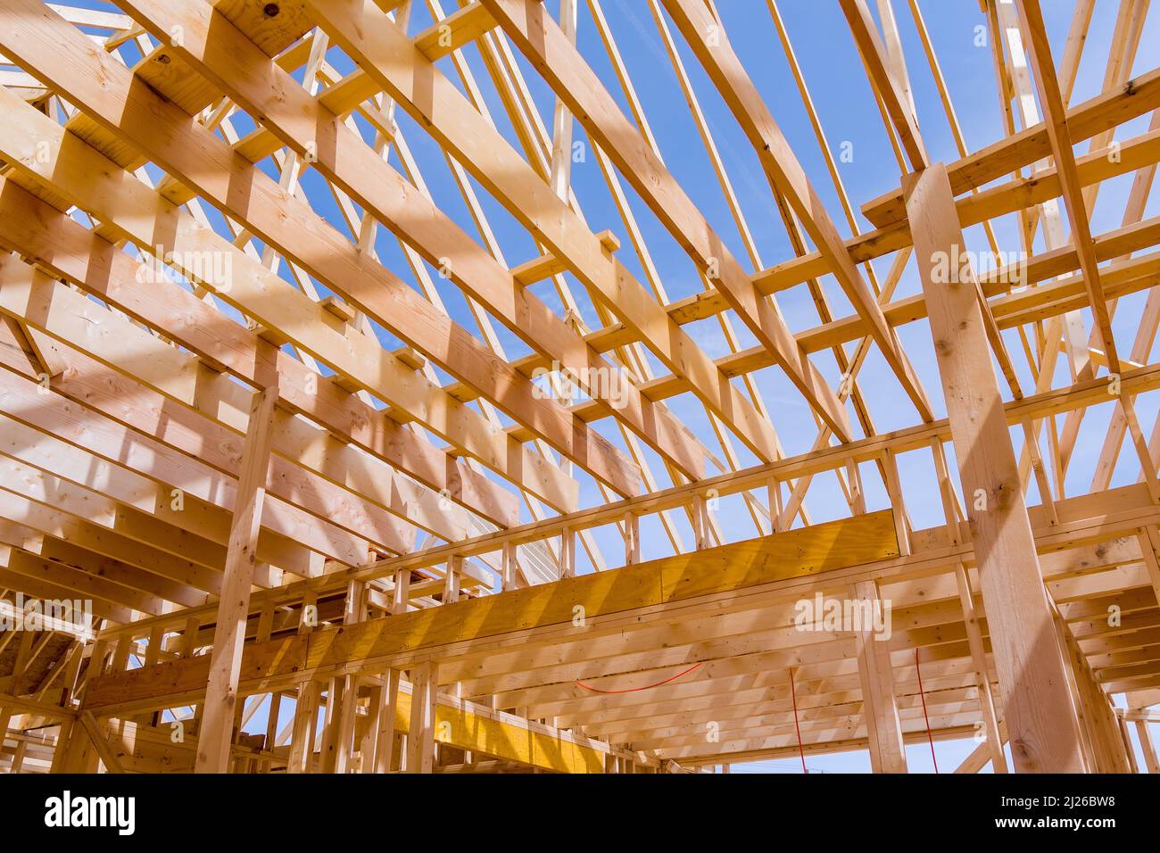 Wood roof trusses constructed with beams timber Stock Photo - Alamy
