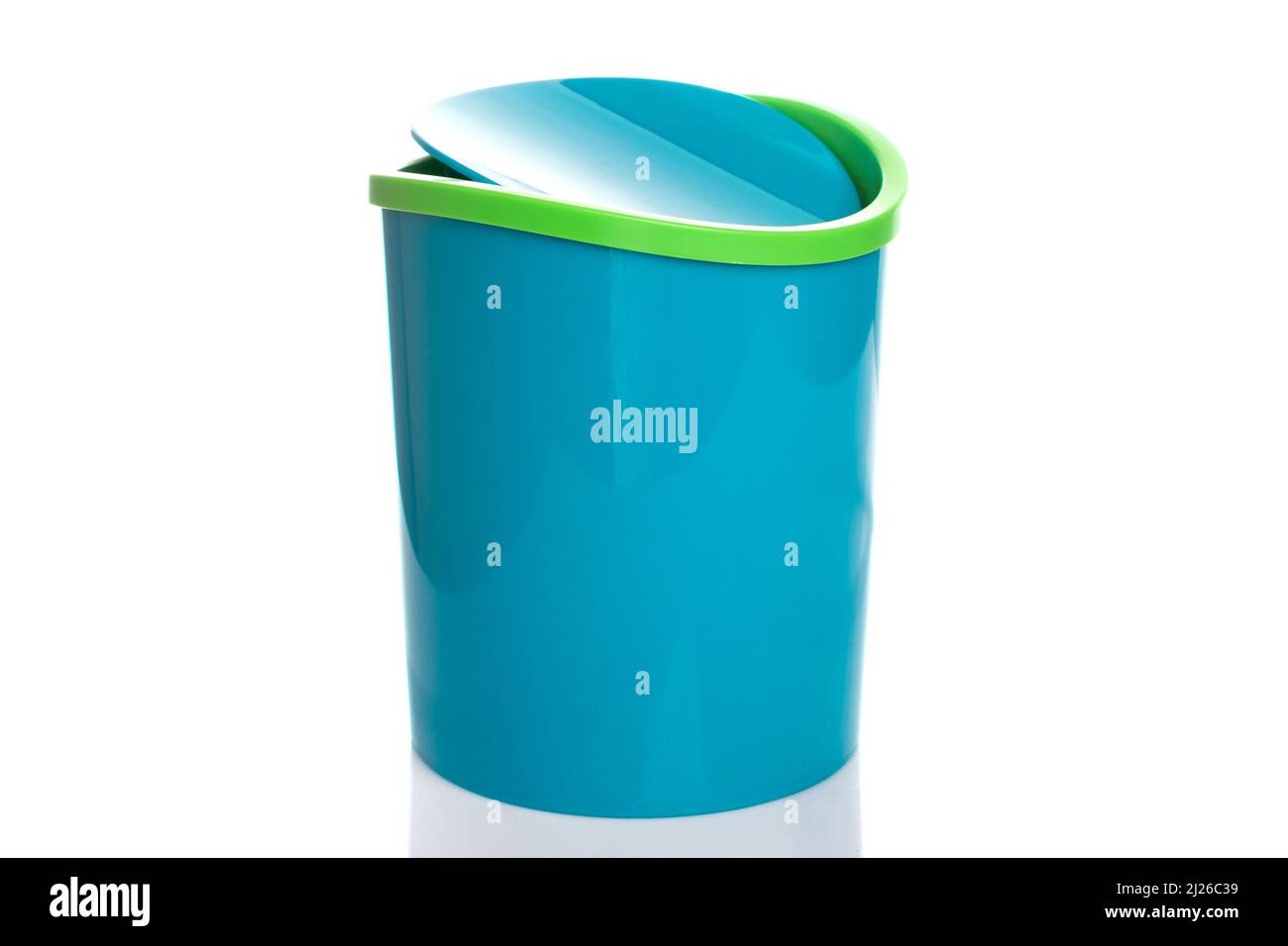 trash can of blue color with a lid made of plastic on a white isolated ...