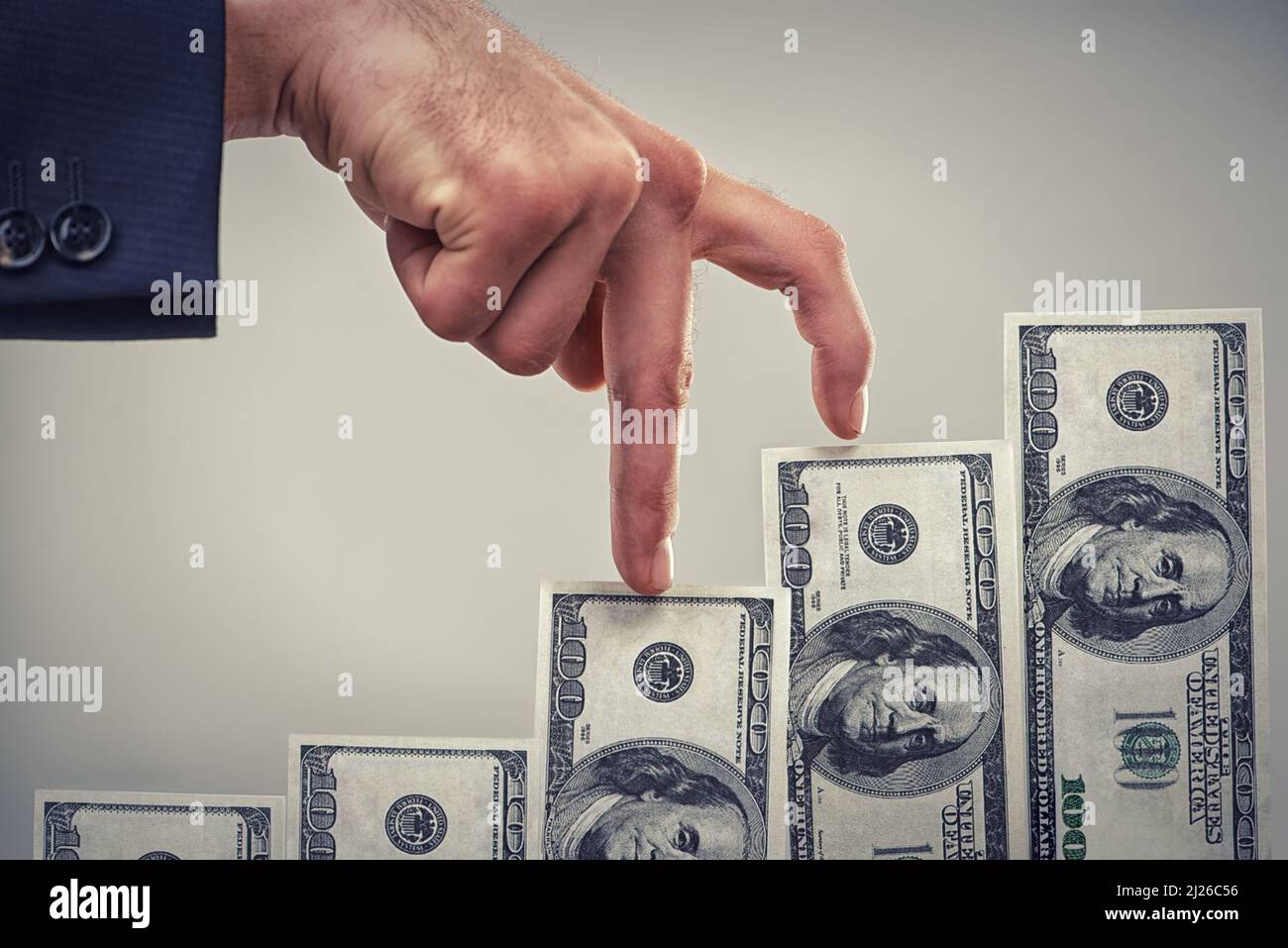 Working his way up to becoming a rich succesful business man. Close up ...