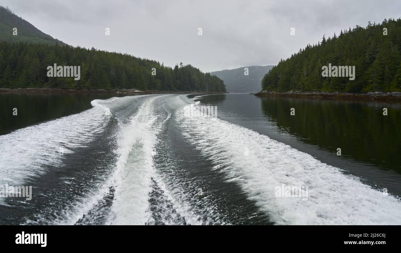 White boat wake as seen from the stern of a powerboat travelling at ...
