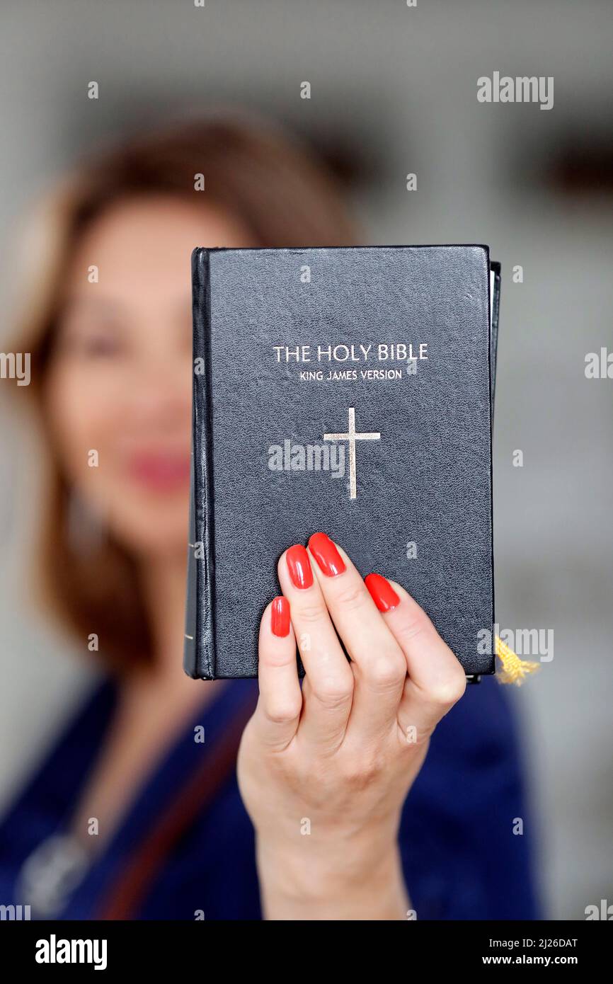 Christian woman with Holy bible Stock Photo - Alamy