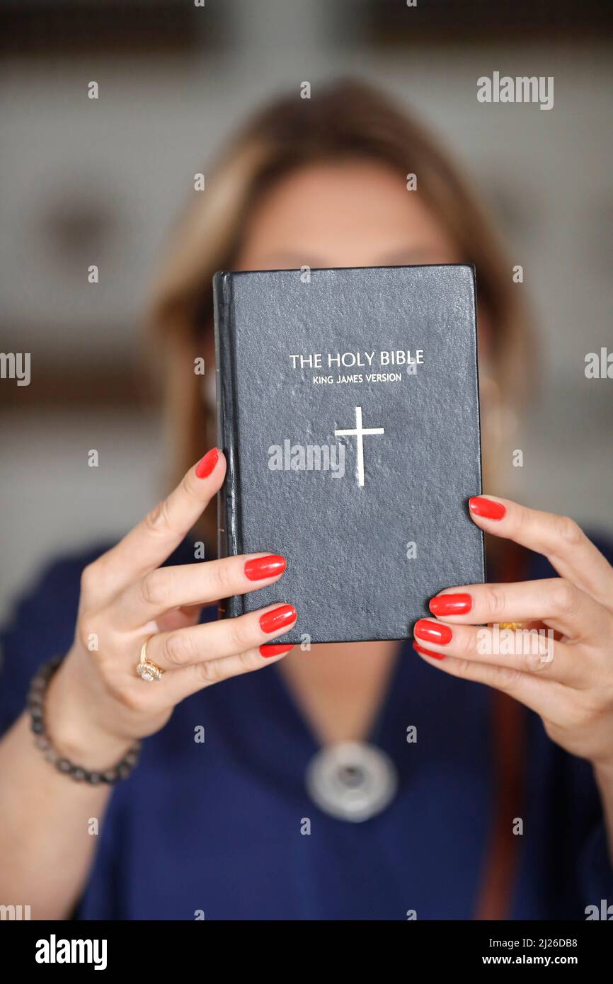 Christian woman with Holy bible Stock Photo - Alamy