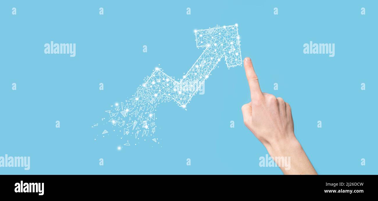 Businessman hold graph, arrow of positive growth icon.pointing at ...