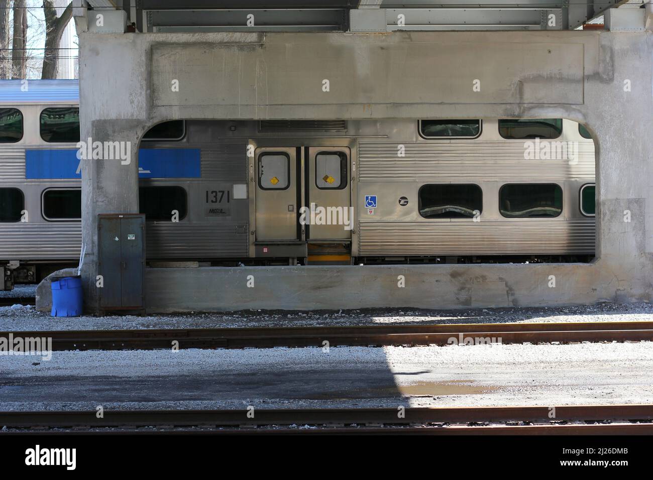 Railroad tracks at the local public train station Stock Photo - Alamy