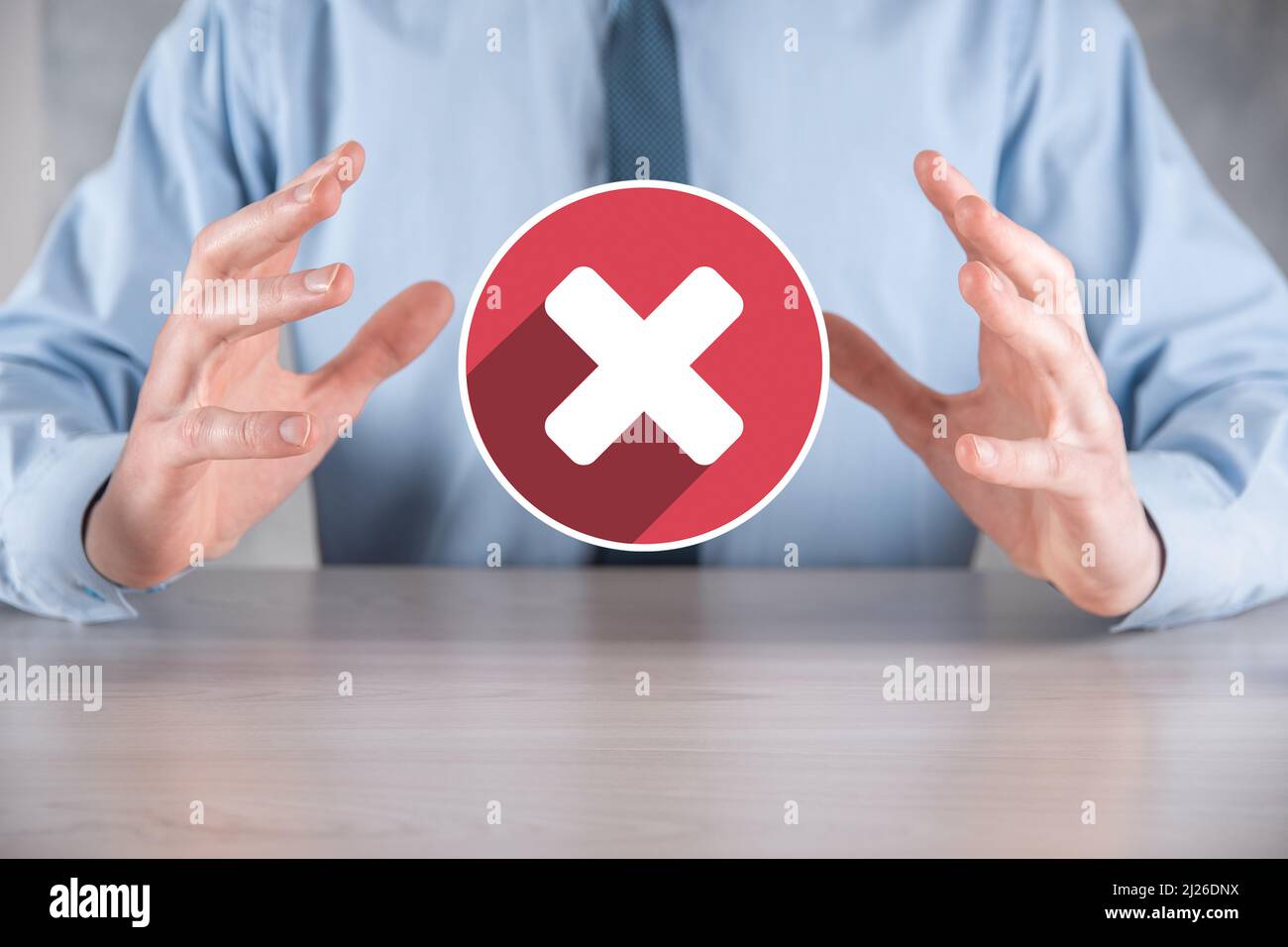 Hand holds icon,cancellation symbol,cancel icon.Cross mark flat red ...