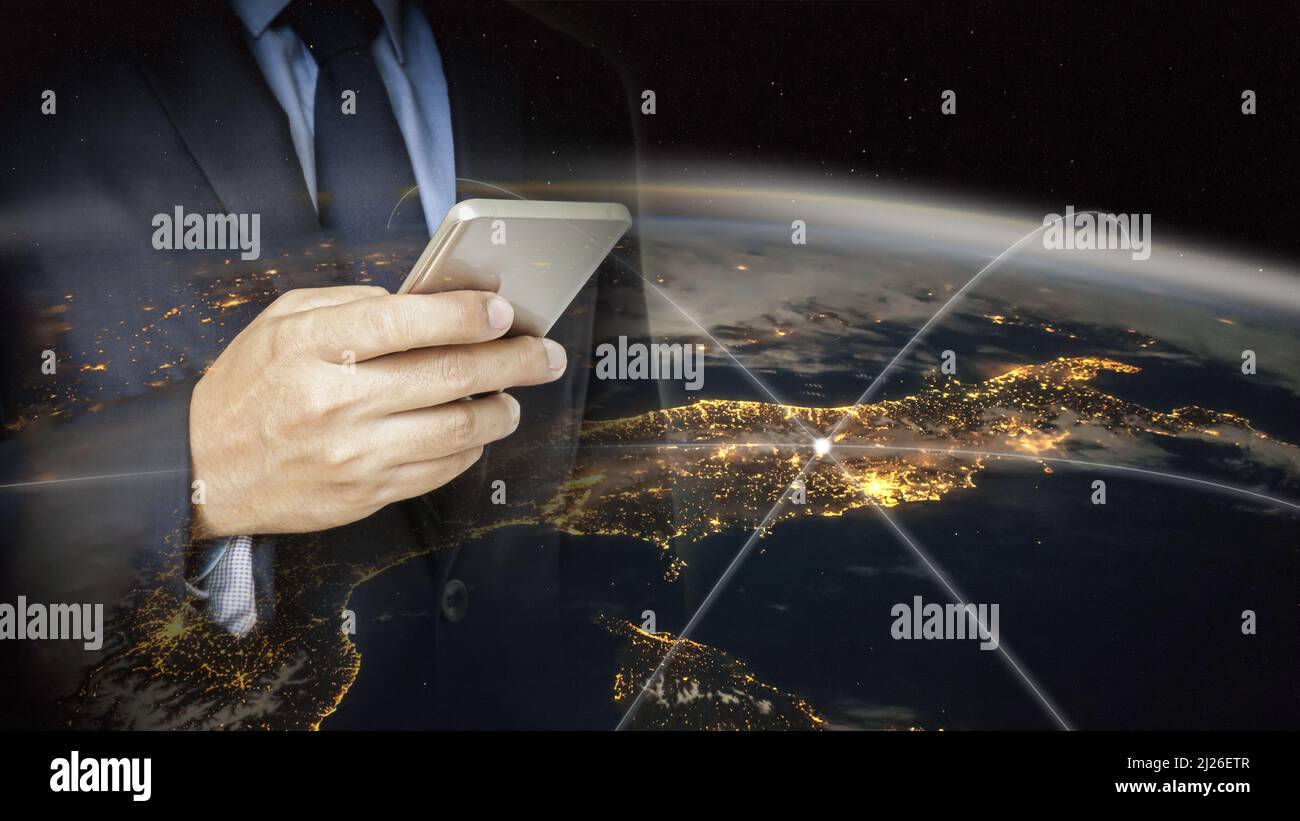 Double exposure of hand hold smart phone with world background.Elements ...