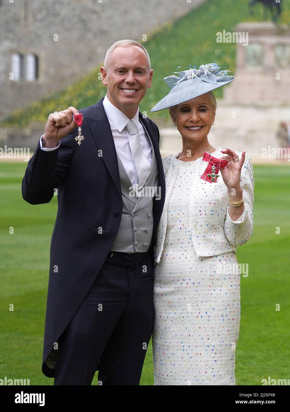 Robert Rinder and his mother Angela Cohen after receiving their MBE ...