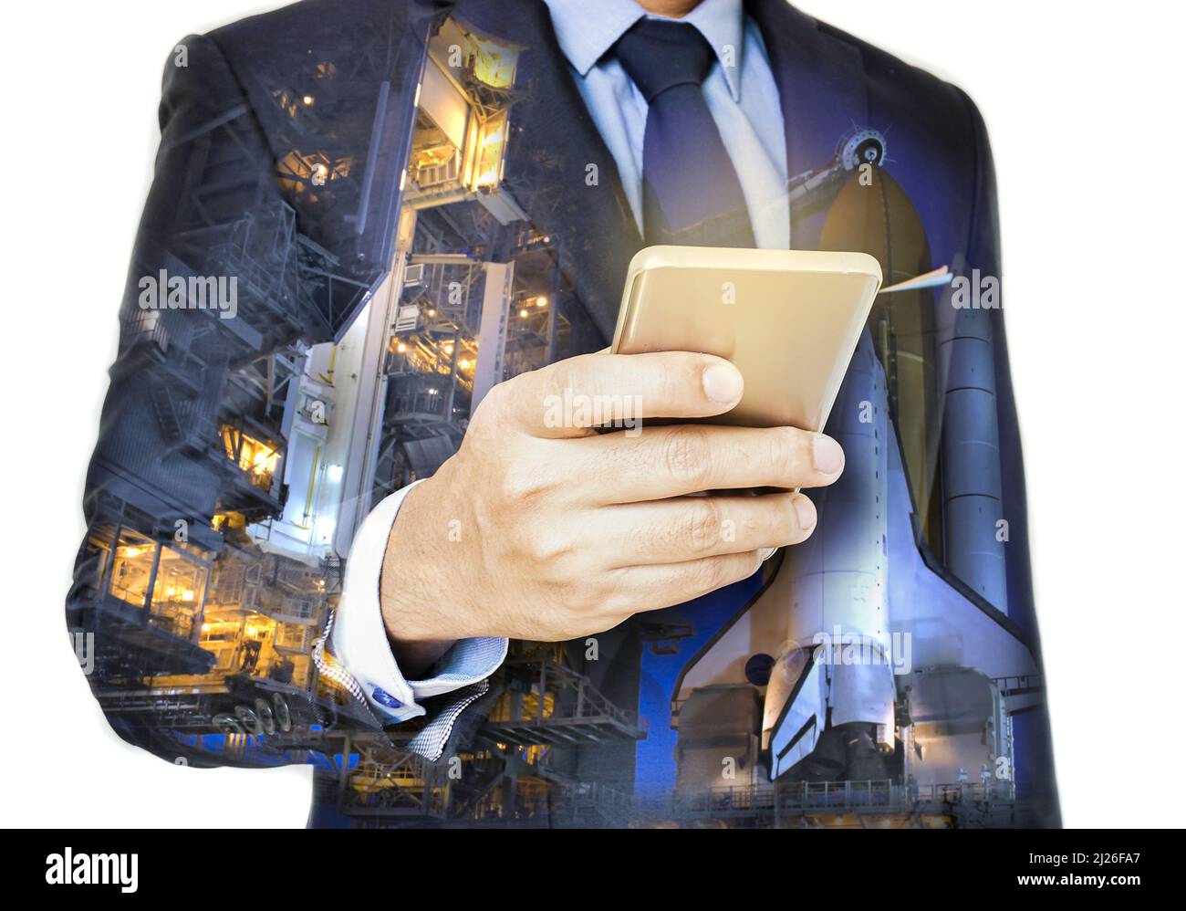Double exposure of hand hold smart phone with spaceport .Elements of ...