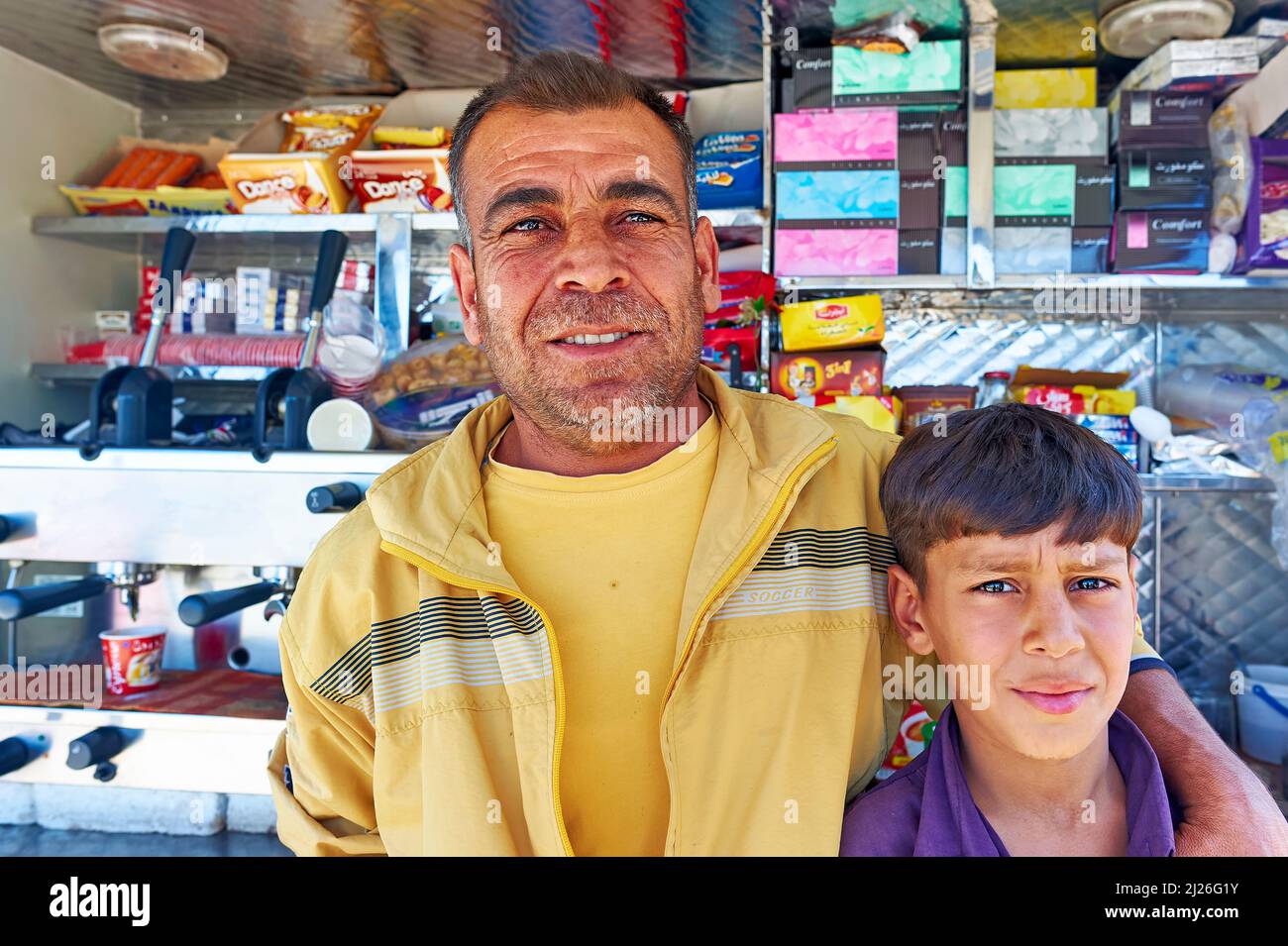 Syria. Portrait of a proud father with his on Stock Photo - Alamy