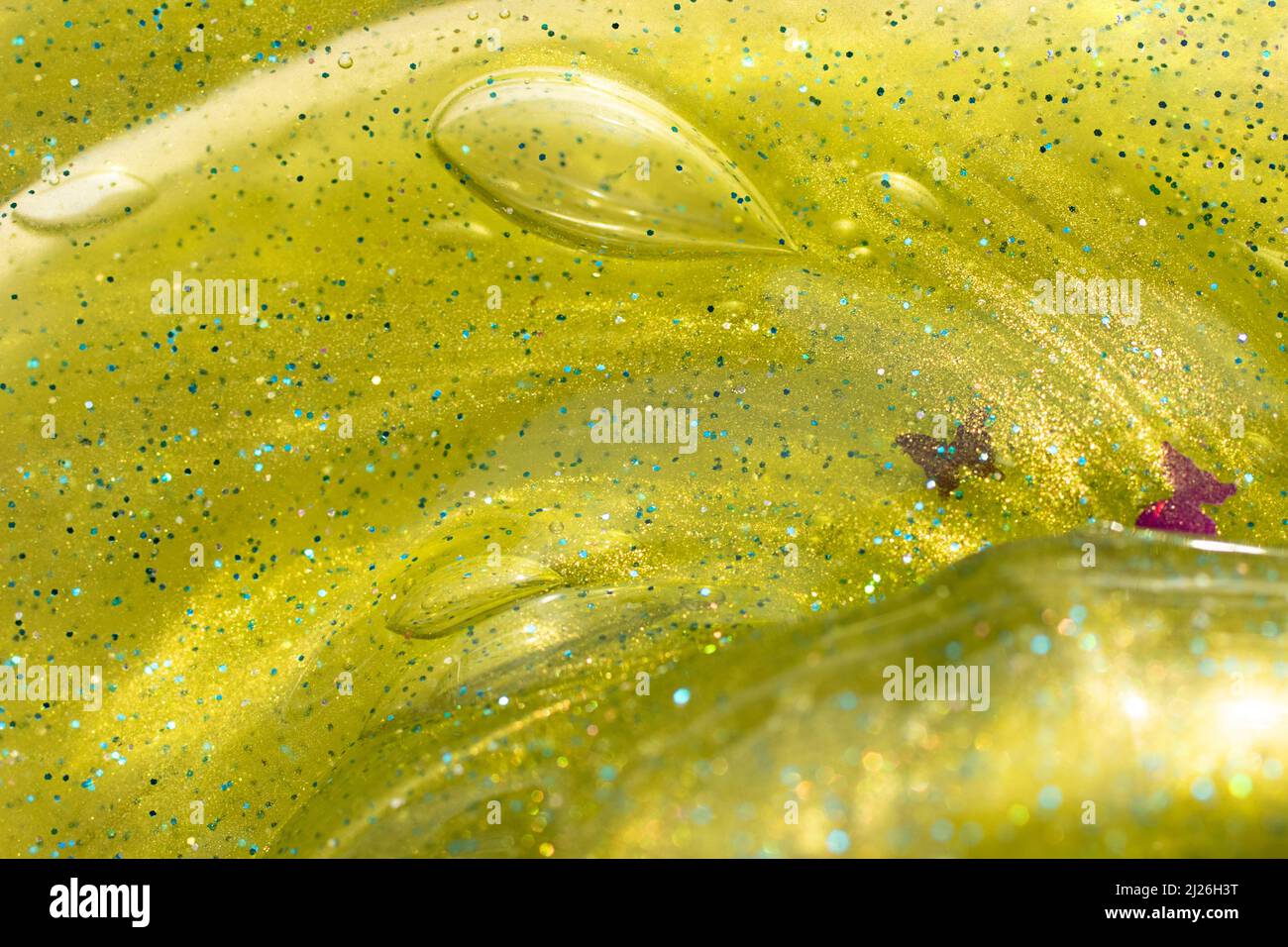 Macro photography of the slime texture.Abstrat green background with ...
