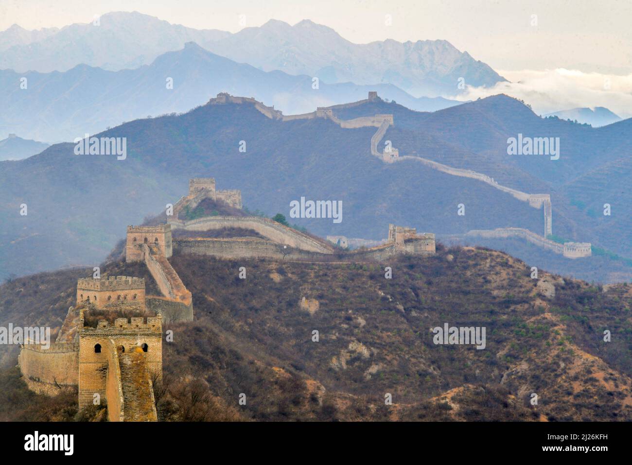 CHENGDE, CHINA - MARCH 30, 2022 - Clouds and fog cover the Jinshanling ...