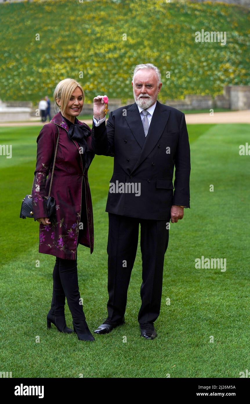 Queen drummer Roger Taylor with his wife Sarina, after being made an ...