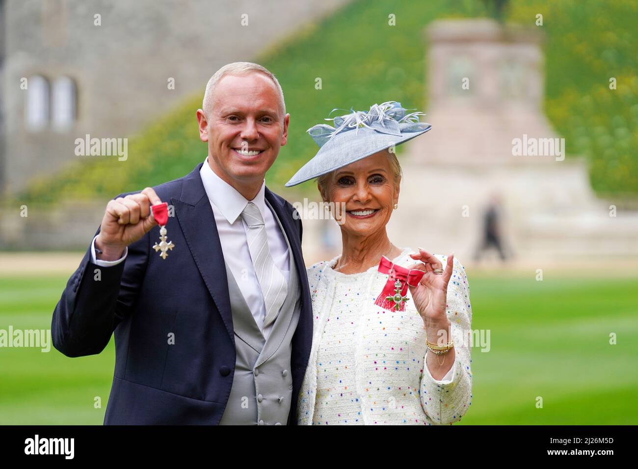 Robert Rinder and his mother Angela Cohen after receiving their MBE ...