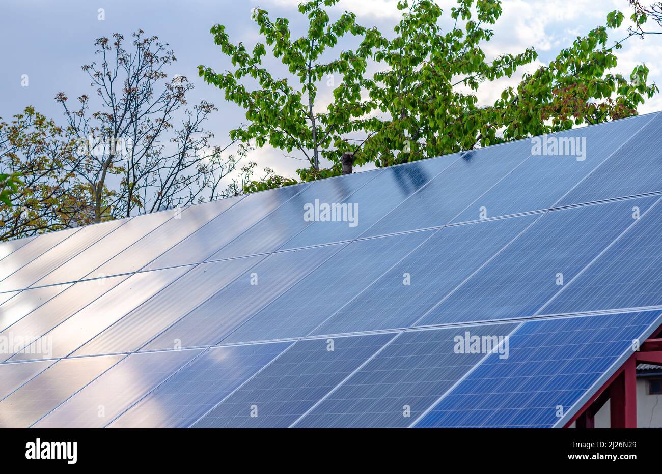 Solar panels on roof of building. Solar energy. Alternative source of ...