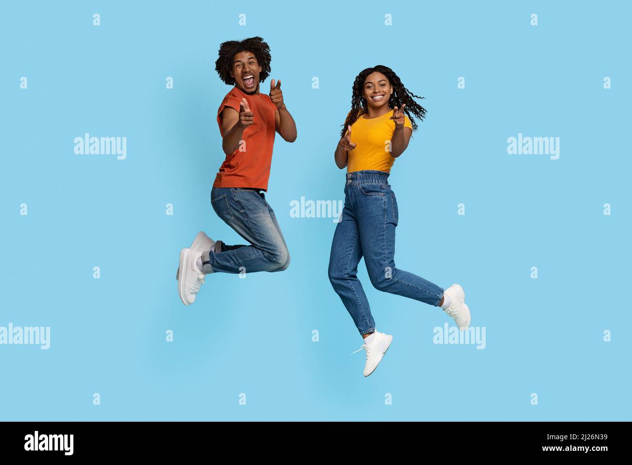 Black couple cheering jumping hi-res stock photography and images - Alamy