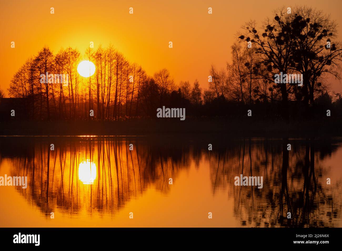 Sunset sky reflecting in water hi-res stock photography and images - Alamy