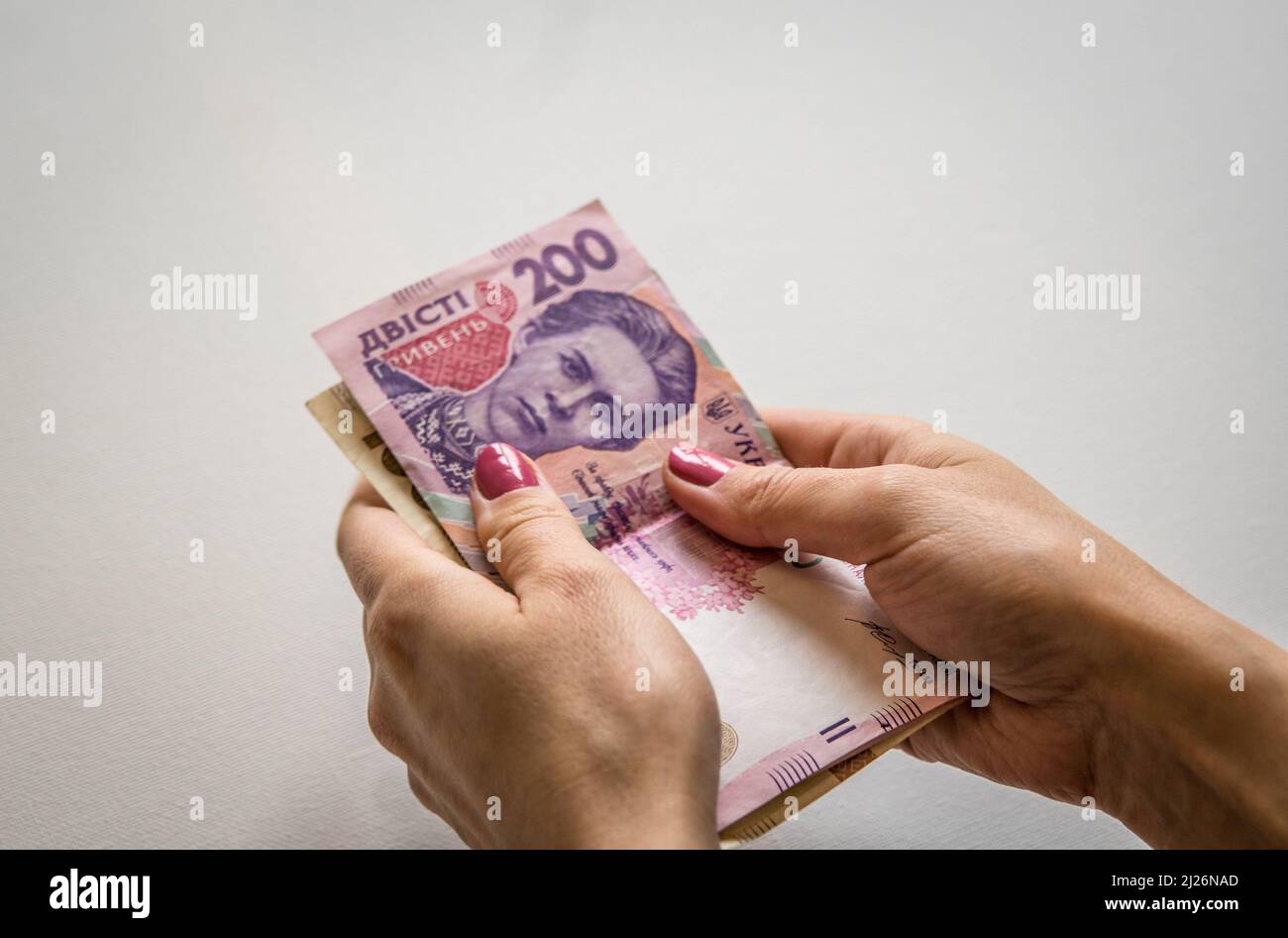 Woman's Hands with Painted Nails Counting Ukrainian Hryvnia Banknotes ...