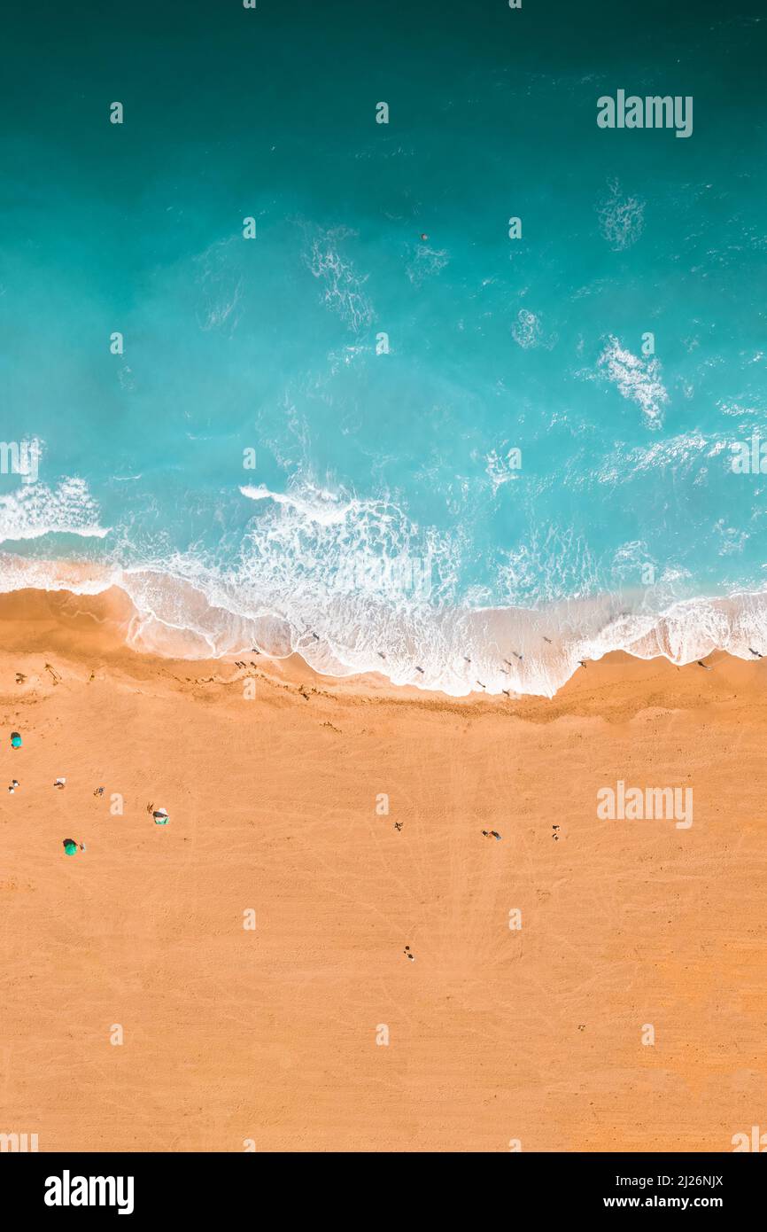 A aieral top view of a blue ocean waves and sandy coast Stock Photo - Alamy