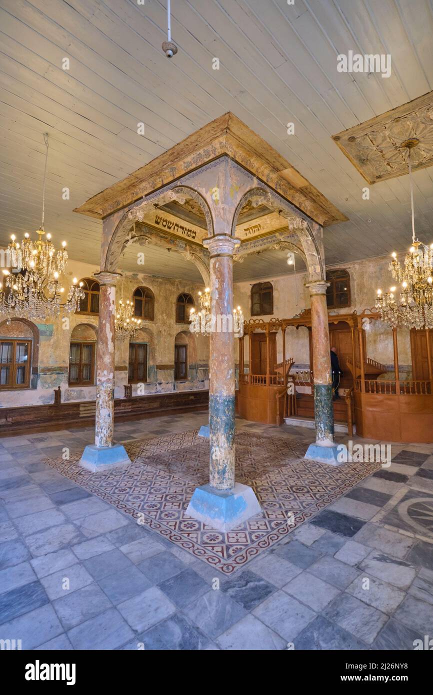 The synagogue space, with central bima. Restoration stripped past paint ...