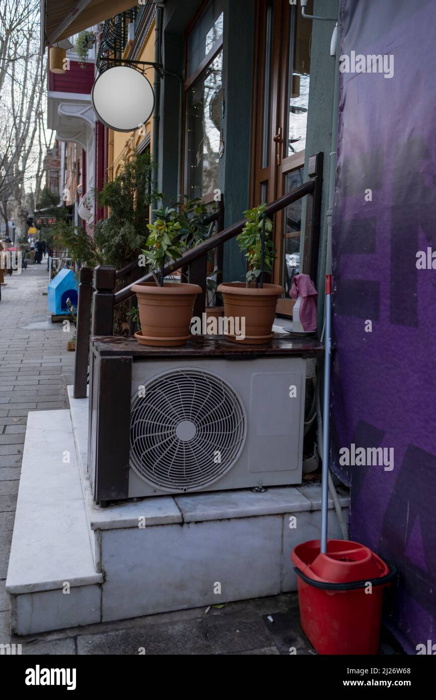 Side view of a small cafe's entrance with stairs. blank signboard Stock ...
