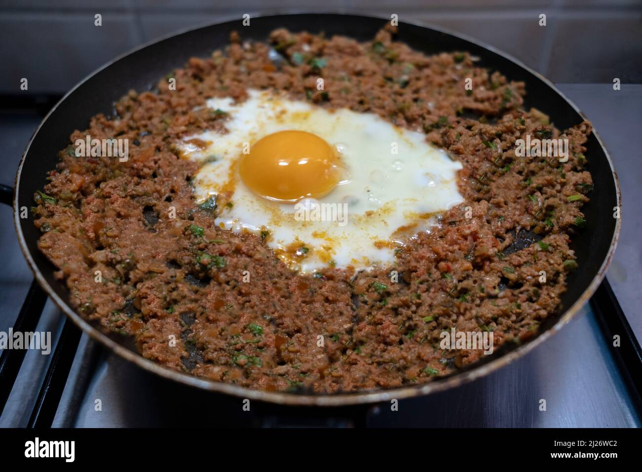 Stir-fried mince and eggs. Selective Focus egg. Front view Stock Photo ...
