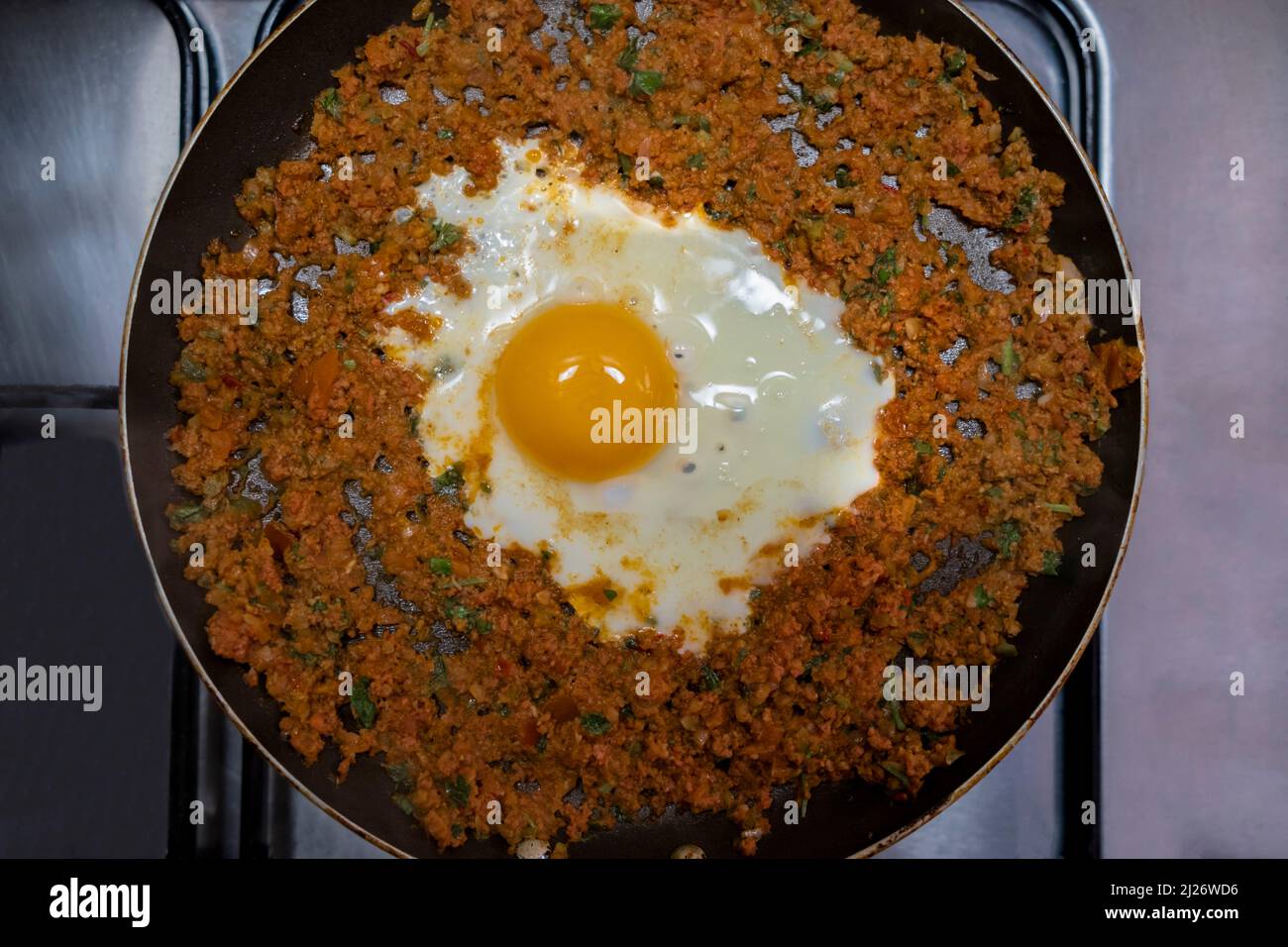 Stir-fried mince and eggs. Selective Focus egg. Front view Stock Photo ...