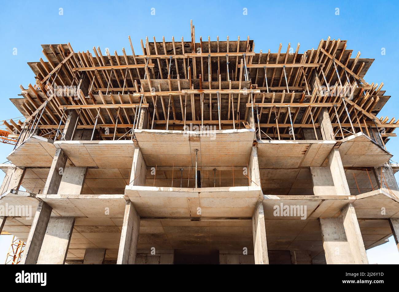 Concrete box of the building under construction. Skyscraper is built ...