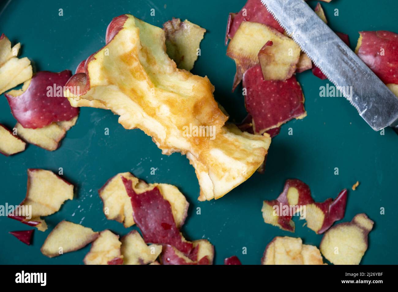 core and skin of a red apple Stock Photo - Alamy